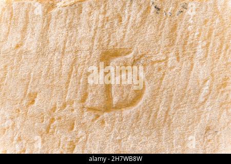 Stonework mark or symbol on the stone wall of the 12th century ...