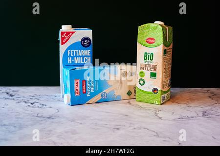 Berlin, Germany - November 25, 2021: View of different packs of milk ...