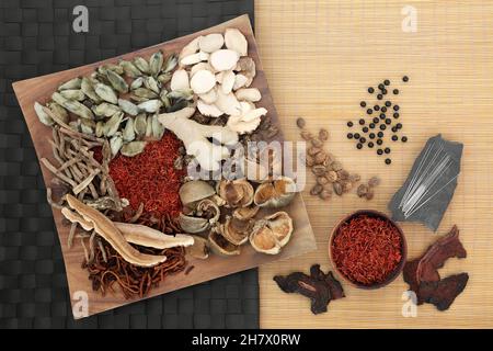 Traditional chinese herbal medicine pills spilling from bottle Stock ...