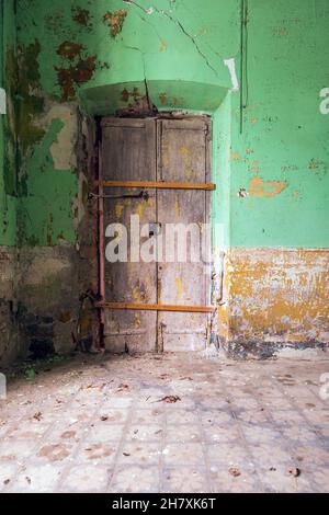 Window of dilapidated Art Nouveau building on Vilandes Iela, Riga ...