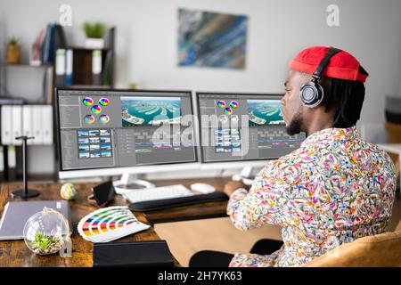 African American Video Editor Tech Job Using Computer Stock Photo - Alamy
