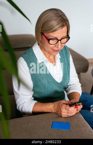 Handsome photographer on color background Stock Photo - Alamy