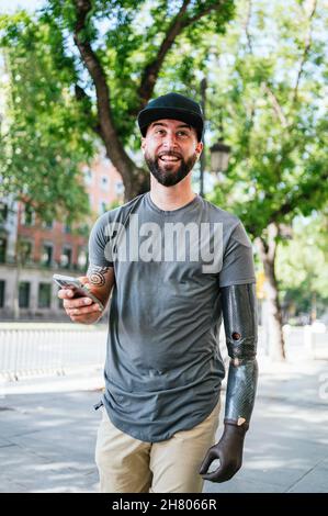 Attractive long haired Hispanic lady looking at camera on blurred ...