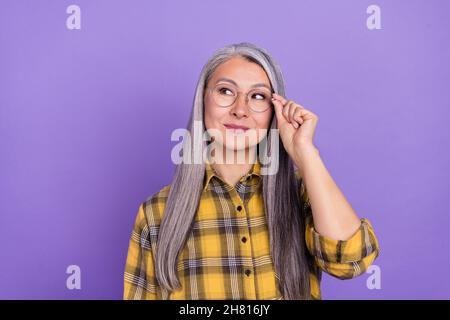 Photo of minded lady look empty space suspicious offer hmm hard ...