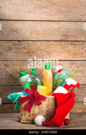 Christmas cleaning concept. Various bottles, equipment, and accessories ...