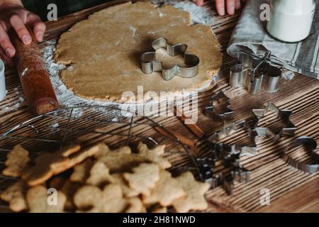 Christmas cookies. Top view of female hands holding, cooking raw ...
