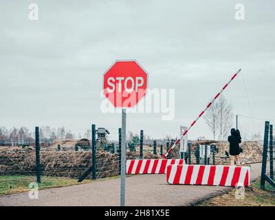 Road checkpoint with STOP sign. Peacekeeping Force Post. Blocking the ...