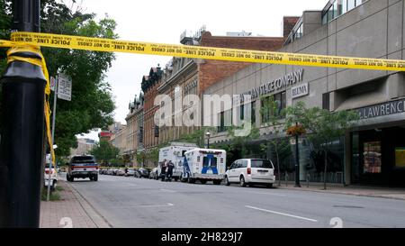 Toronto, Ontario, Canada - 06/04/2010: Police line tape and police cars ...