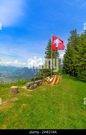 Woman in Brambruesch in Switzerland. Swiss cable car of Chur city with ...