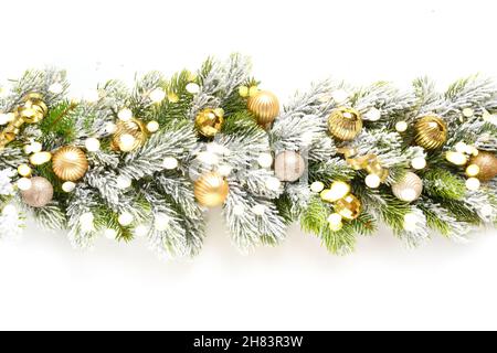 Christmas garland with baubles and lights Stock Photo - Alamy
