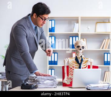 Angry boss yelling at his skeleton employee Stock Photo - Alamy