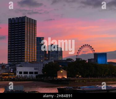 A beautiful shot of a bright orange sunset sky over a seashore Stock ...