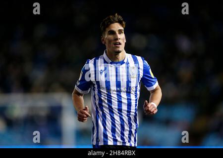Theo Corbeanu #23 of Sheffield Wednesday runs forward with the ball ...
