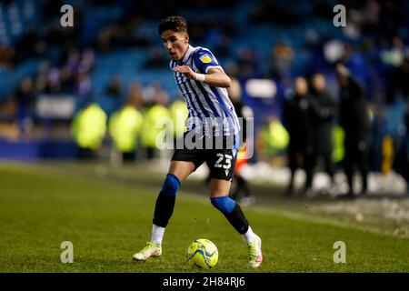Theo Corbeanu #23 of Sheffield Wednesday runs forward with the ball ...