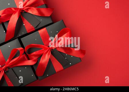 Christmas gift boxes with sequins on blue background Stock Photo - Alamy
