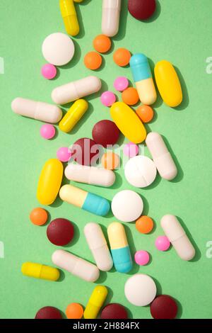 Various capsules with dietary supplements or medicines in honeycomb ...