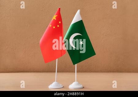 Flags of China and Pakistan on color background Stock Photo - Alamy