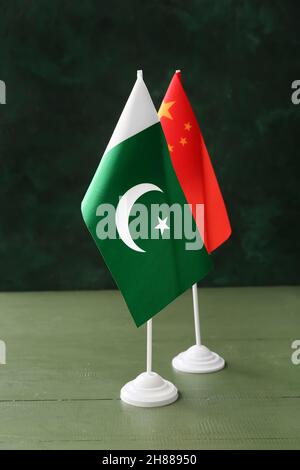 Flags of China and Pakistan on green background Stock Photo - Alamy