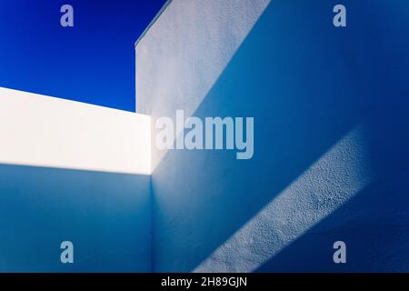 White walls geometric angled shapes of simple and clean design in sunny ...