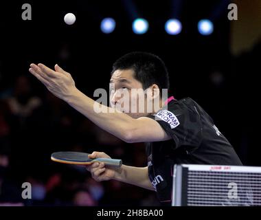 South Korea's Jang Woojin serves against Taiwan's Lin Yun-ju during ...