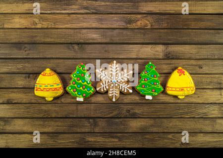 Christmas pattern with copy space. Gingerbread cookies dark on wooden ...