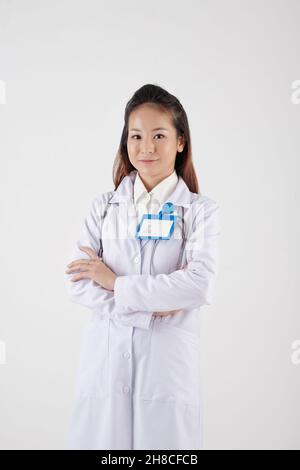Young Asian female healthcare worker medical professional making phone ...