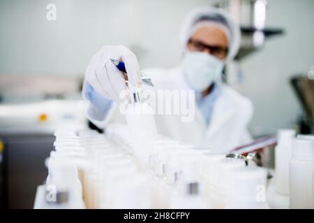 Healthcare industry. Creme production. Working in laboratory with ...