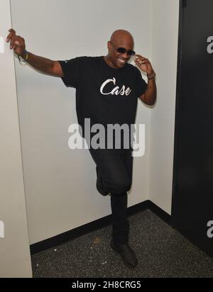 R&B singer Case poses for picture backstage during the 90's Kickback ...