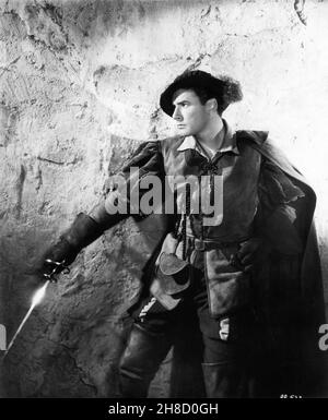 ERROL FLYNN Portrait as Miles Hendon in THE PRINCE AND THE PAUPER 1937 ...