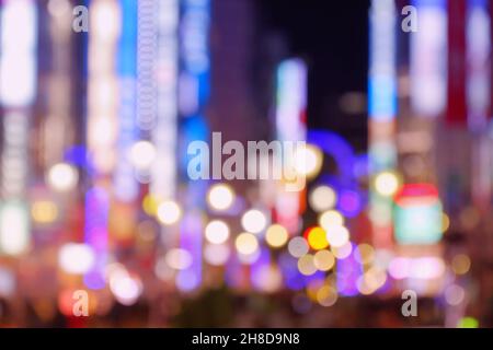 Big city night blurry view. Tokyo, Japan night neons. Defocused ...