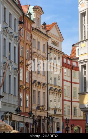 Colourful historic buildings with ornate facades and gables under a ...