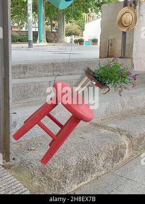Flowers in a pot for exterior decoration Stock Photo - Alamy