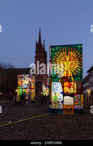 Basel, Switzerland - February 21. Cathedral square with illuminated ...