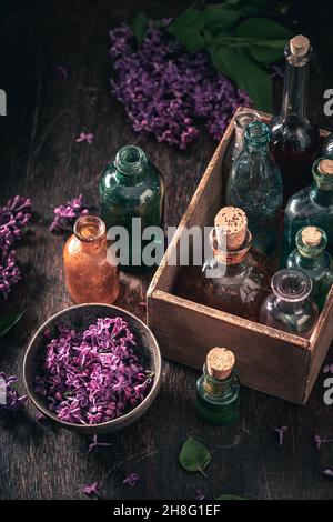 Unique flower aromatherapy for body care. Lilac flower products. Homemade Products of flowers ...