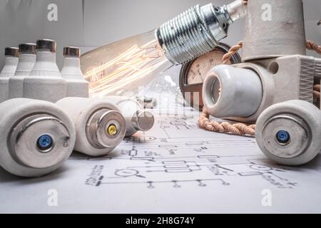 Low voltage light bulb with fuses, cables and diagrams. Old fashioned ...