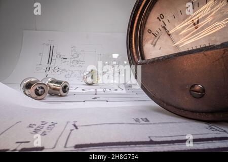 Low voltage light bulb with fuses, cables and diagrams. Old fashioned ...