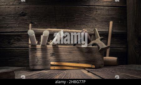 Vintage carpentry tools. with tampers, chisels and planes. Old ...