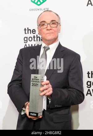 Eamonn Bowles poses with the industry tribute award at the Gotham ...