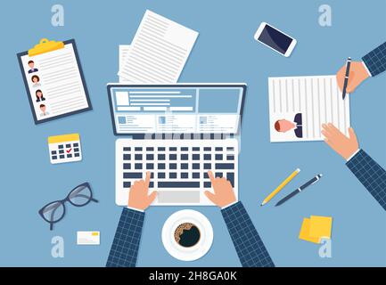 Designed by human resources meeting. Top view of a table, laptop ...