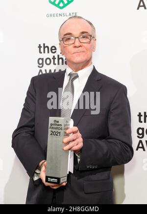 Eamonn Bowles poses with the industry tribute award at the Gotham ...
