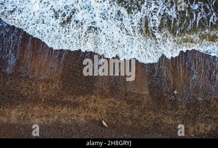 A view of the beach and coastline at Thorpness, Suffolk where homes are ...