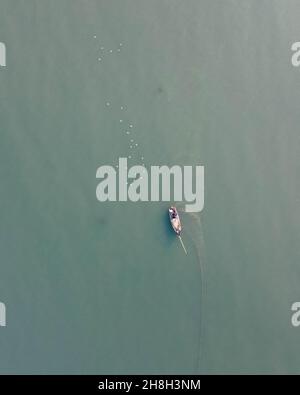 A breathtaking bird's eye view of a small island in Belize surrounded ...