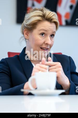 Berlin, Germany. 30th Nov, 2021. Ute Henkel stands in a pedestrian zone ...