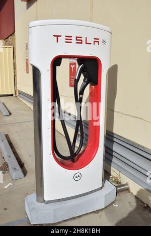 Tesla Super Charger power station at a highway rest stop petrol station ...
