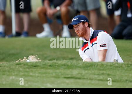 Aaron Wilkin (AUS) hits out of the bunker Credit: Speed Media/Alamy ...