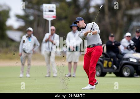 Patrick Cantlay of team USA hits his approach shot during round 2 of ...