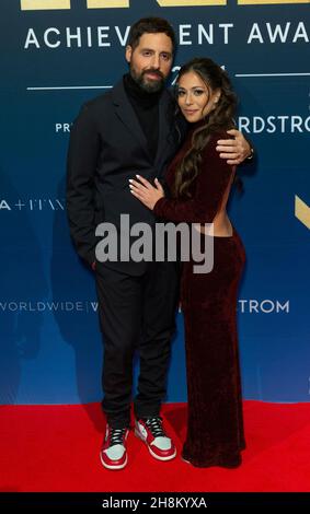 Ronnie Fieg and Shir Yaakov attend the 2021 Footwear News Acheivement ...