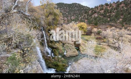 Beautiful shot of huge waterfalls in the Rifle Falls State Park on a ...
