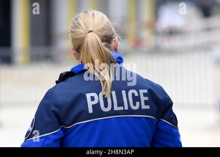 Policewoman with blonde hair Stock Photo - Alamy