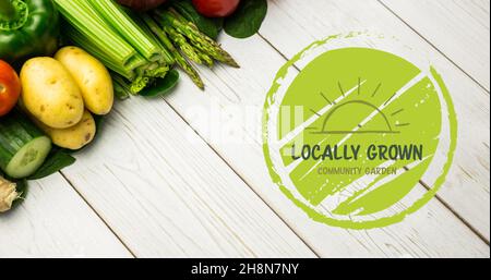 High angle view of fresh vegetables by locally grown community garden ...